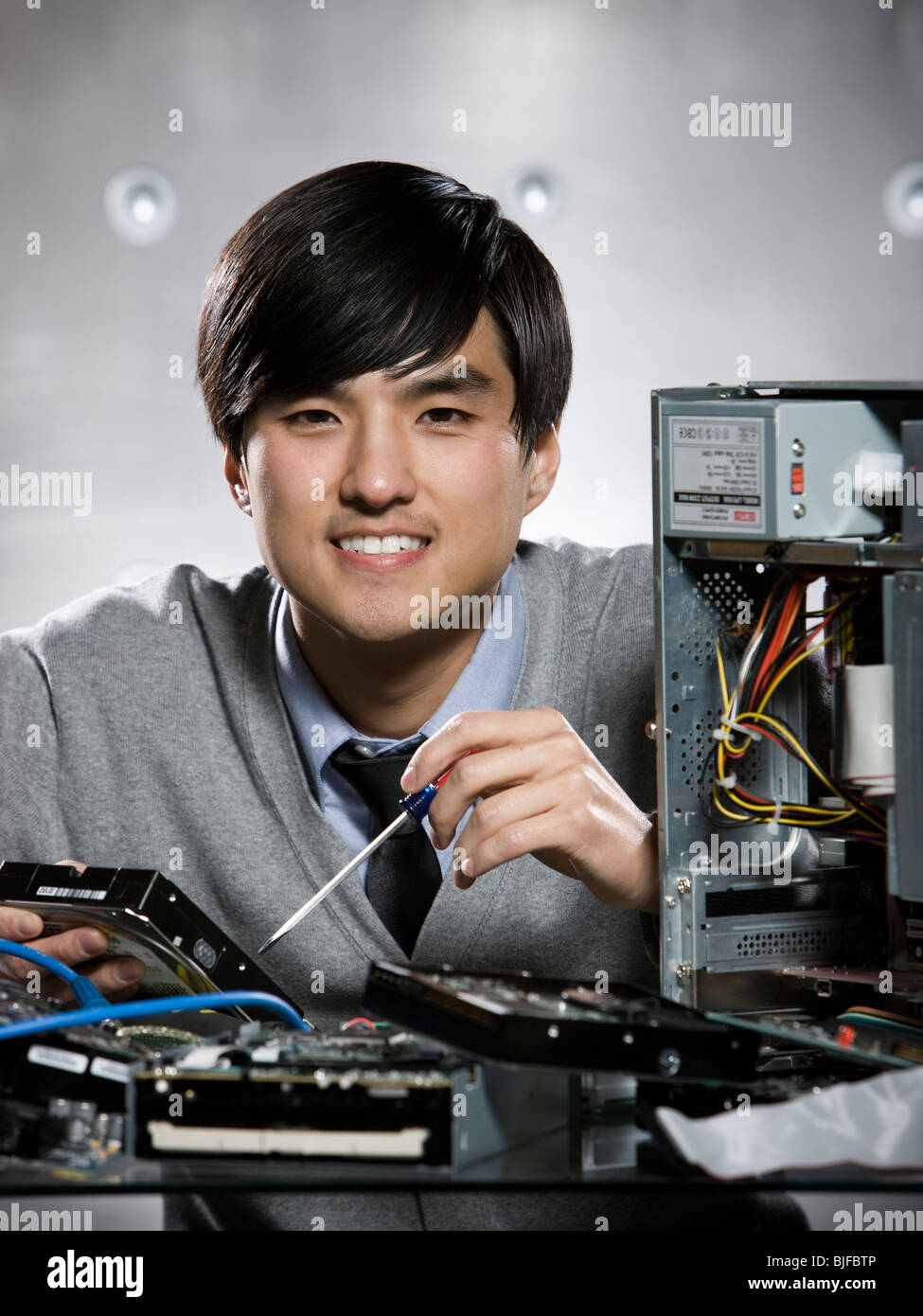 man working on a computer Stock Photo - Alamy