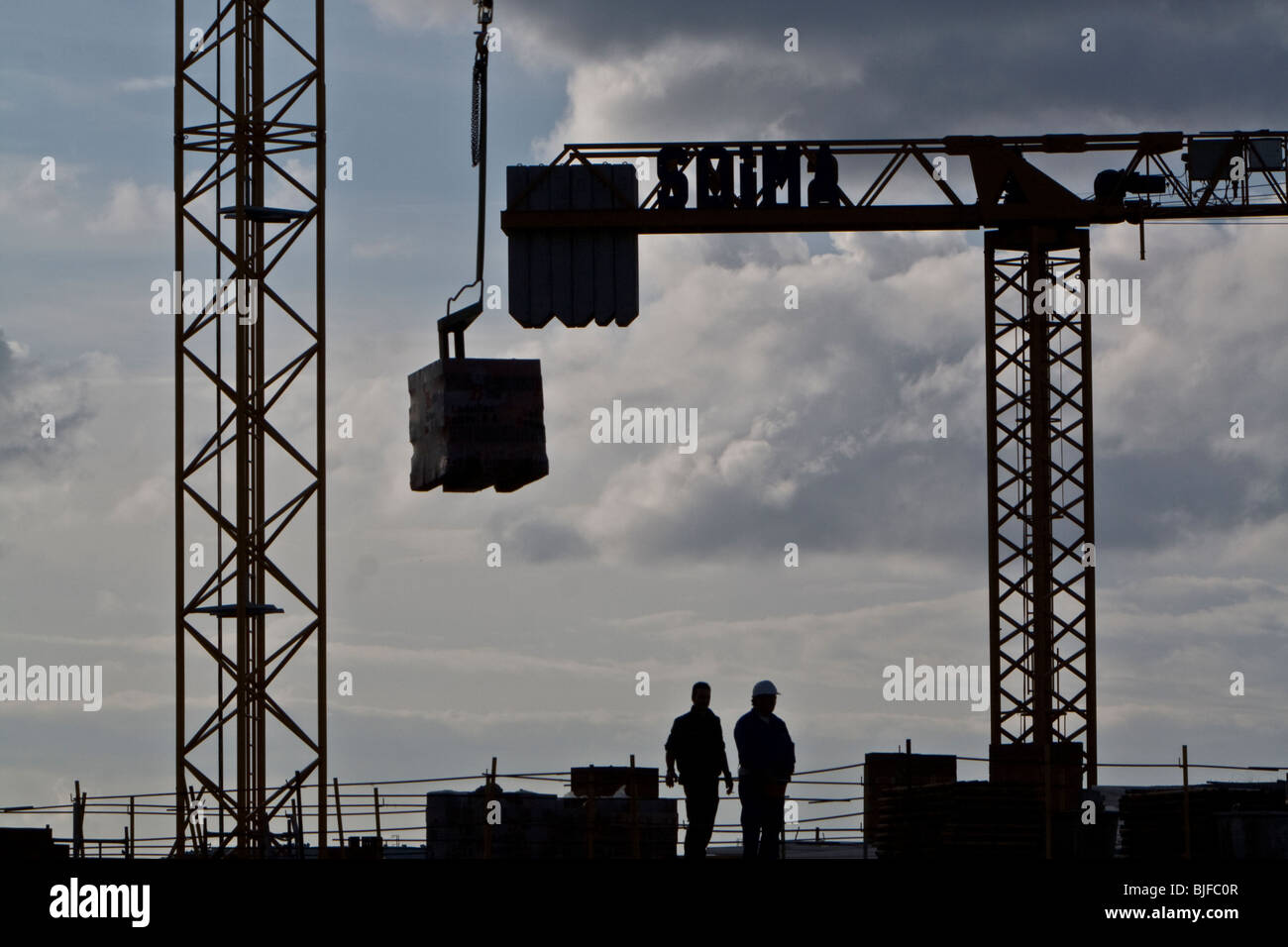Construction worker crane building hi-res stock photography and images ...