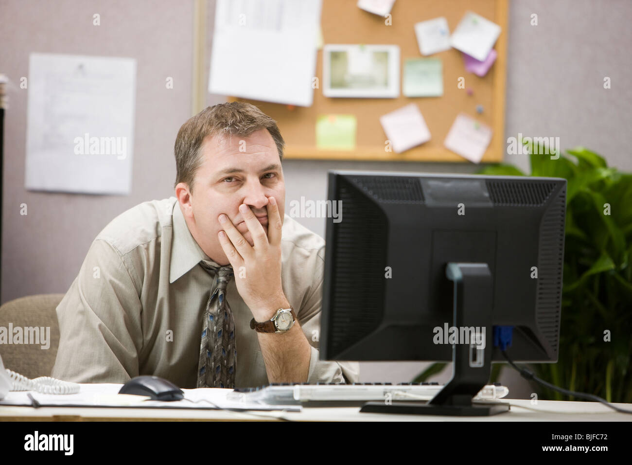 man in a cubicle Stock Photo - Alamy