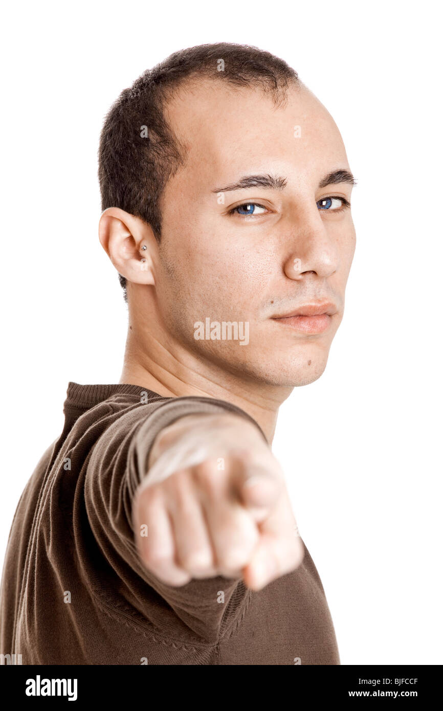 Portrait of a smart guy pointing to something, isolated on white Stock ...