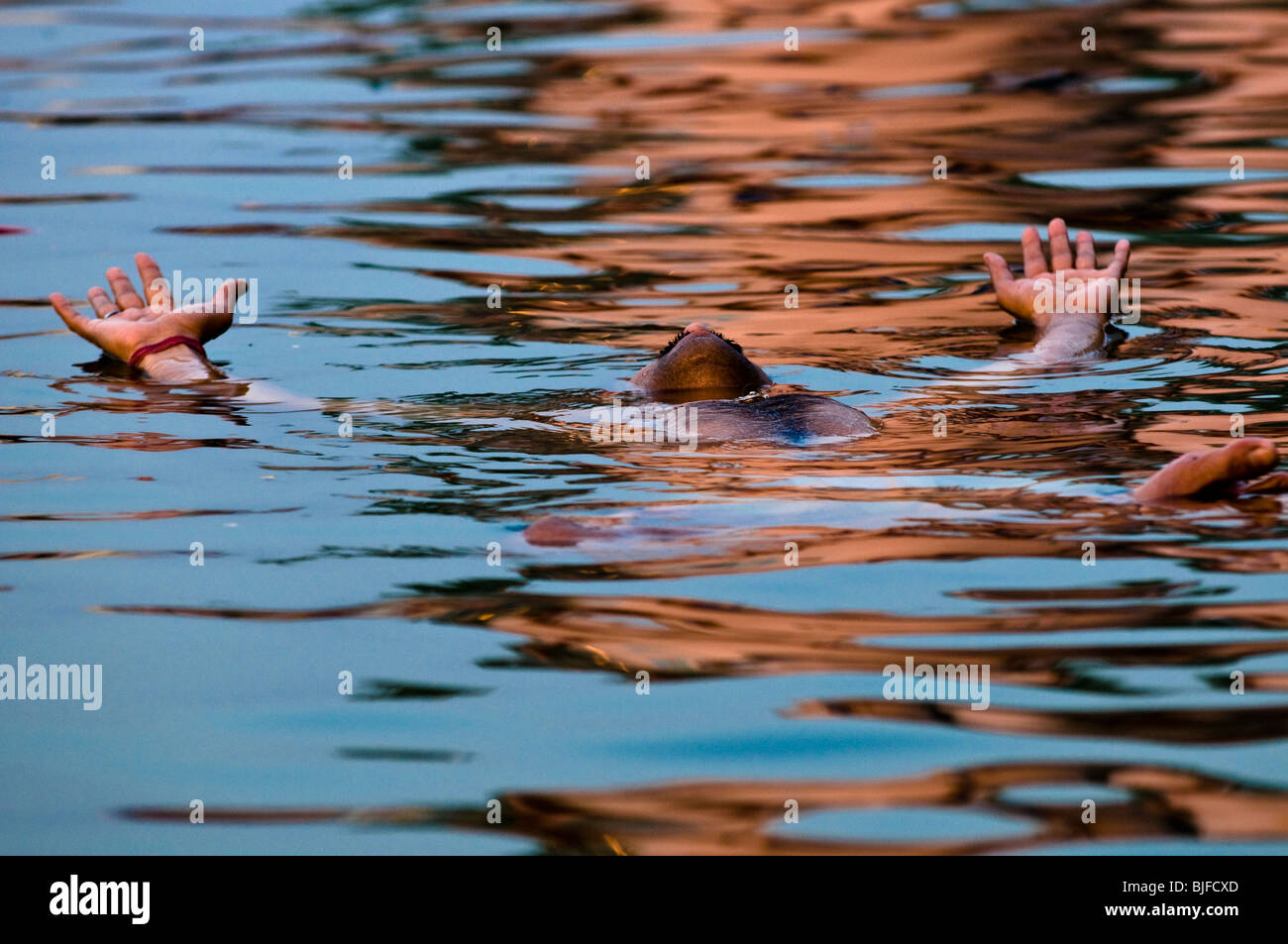 This is an image of a Indian man bathing in the holy Ganges River Stock ...