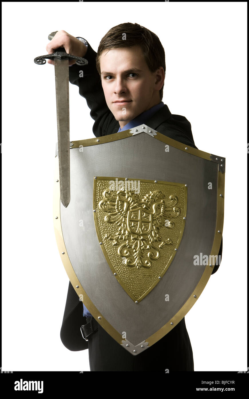 Holding shield sword suit hi-res stock photography and images - Alamy