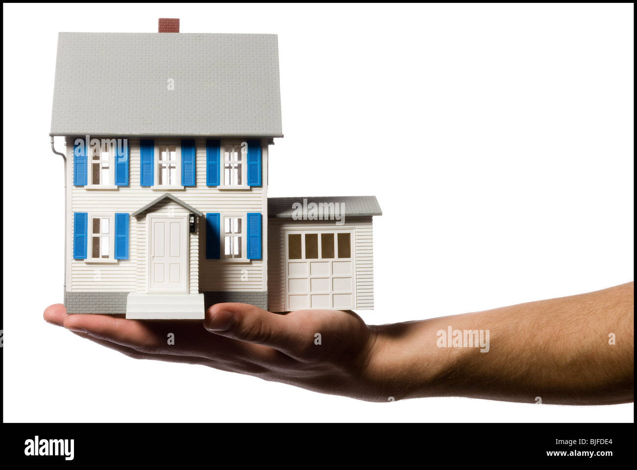hand holding a house Stock Photo - Alamy