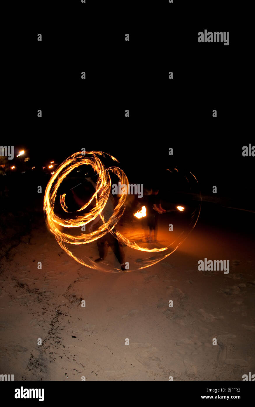Twirling Fire Sticks High Resolution Stock Photography and Images - Alamy