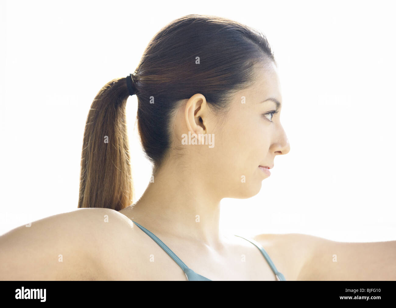 Upper body profile young woman hi-res stock photography and images - Alamy