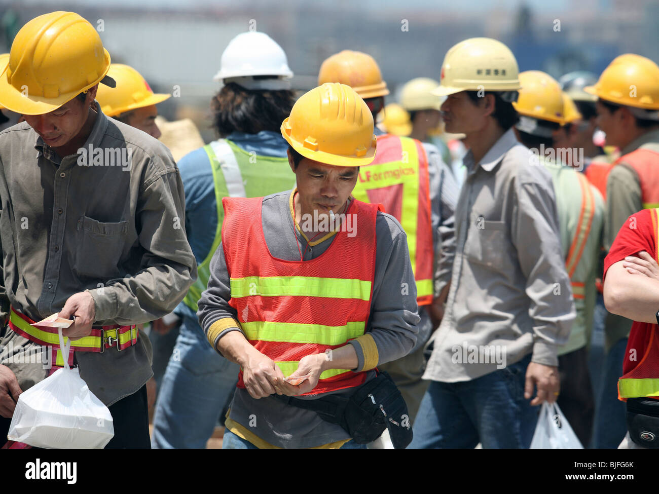 Construction workers in Macao, China Stock Photo - Alamy