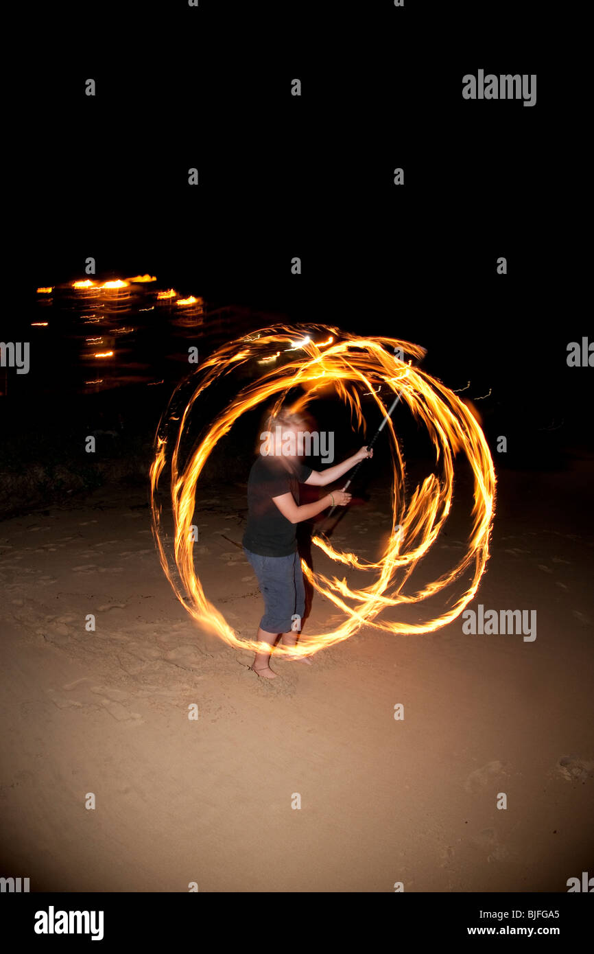 Twirling Fire Sticks High Resolution Stock Photography and Images - Alamy