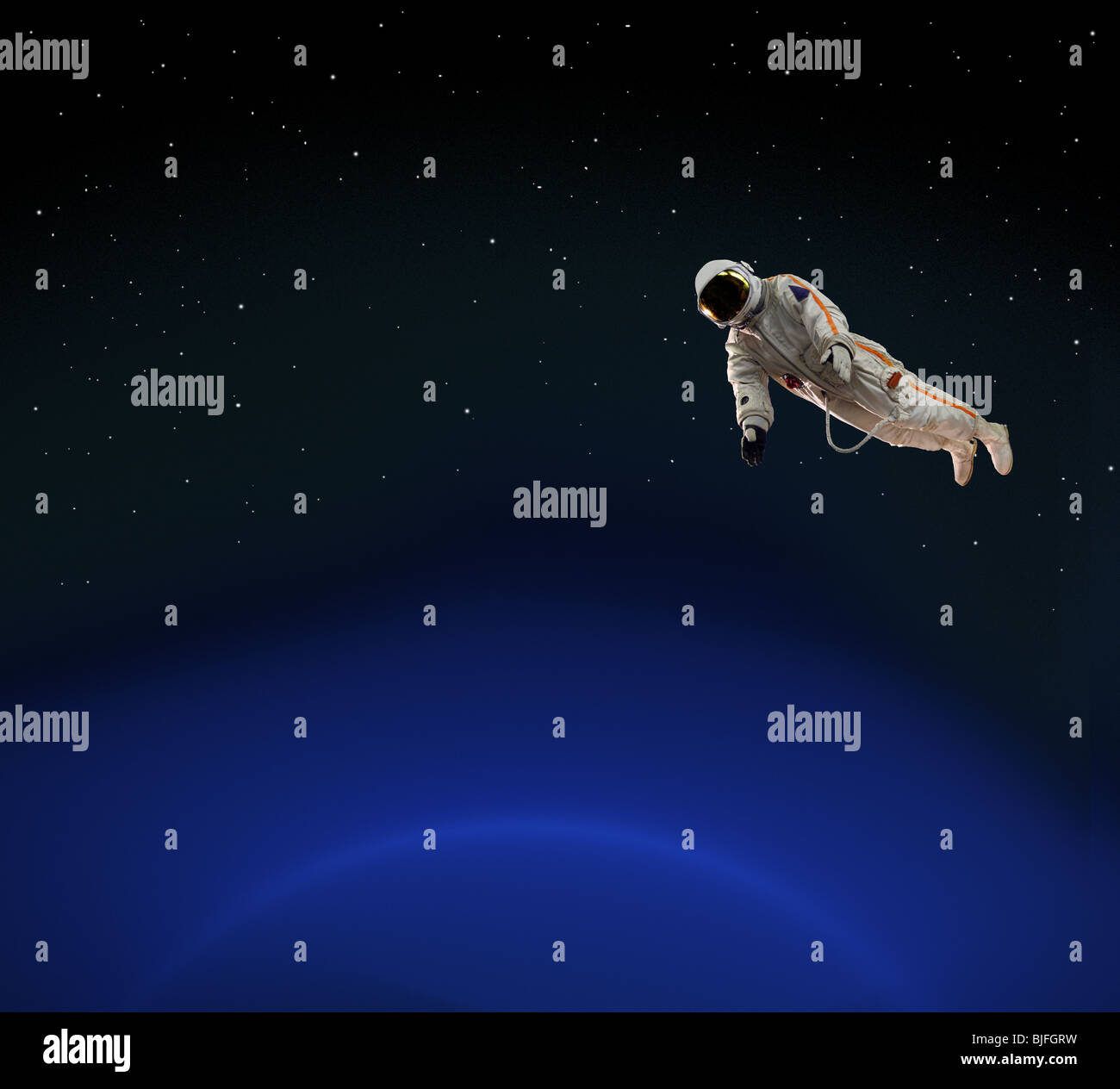 flying astronaut over blue planet in space Stock Photo - Alamy