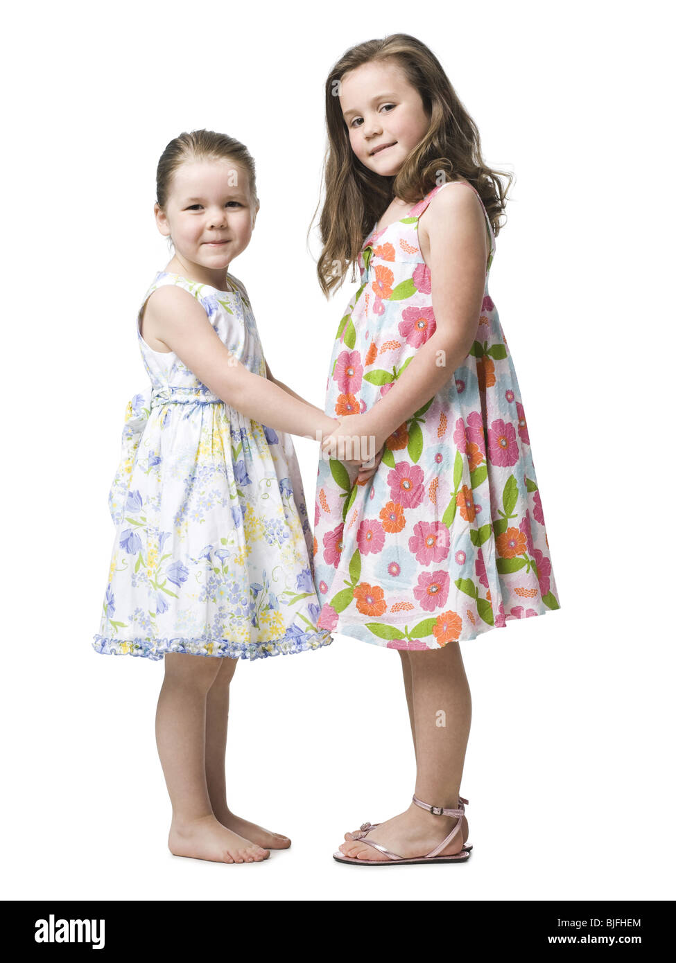 two girls in dresses Stock Photo - Alamy