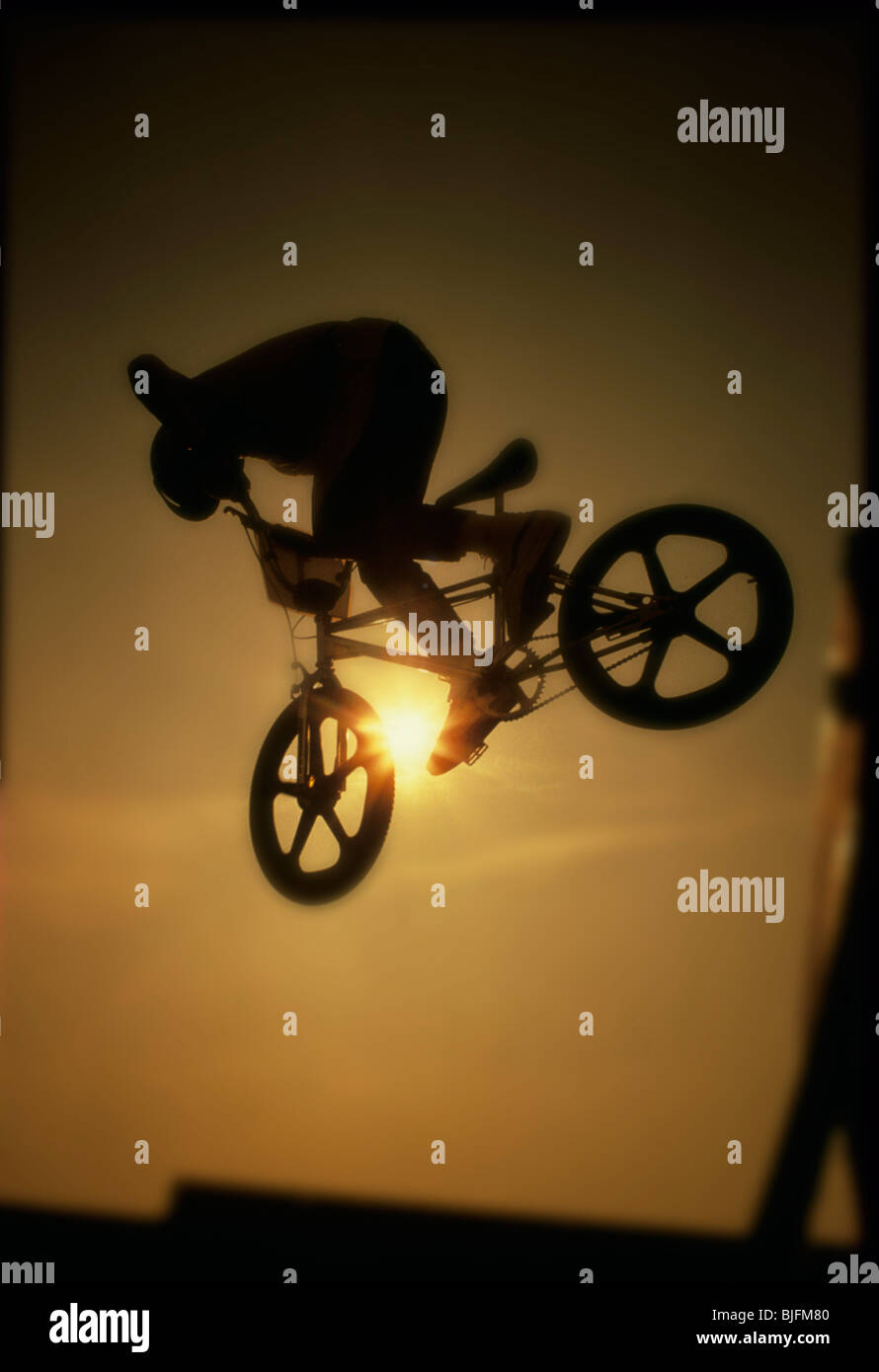 silhouette of a stunt bike rider Stock Photo - Alamy