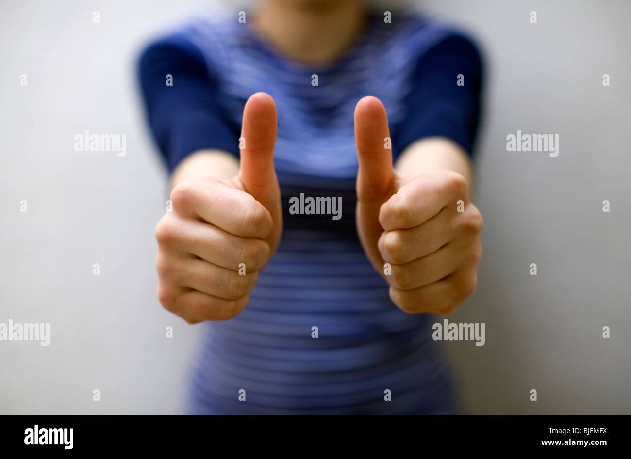 Thumbs up gesture: MODEL RELEASED Stock Photo - Alamy