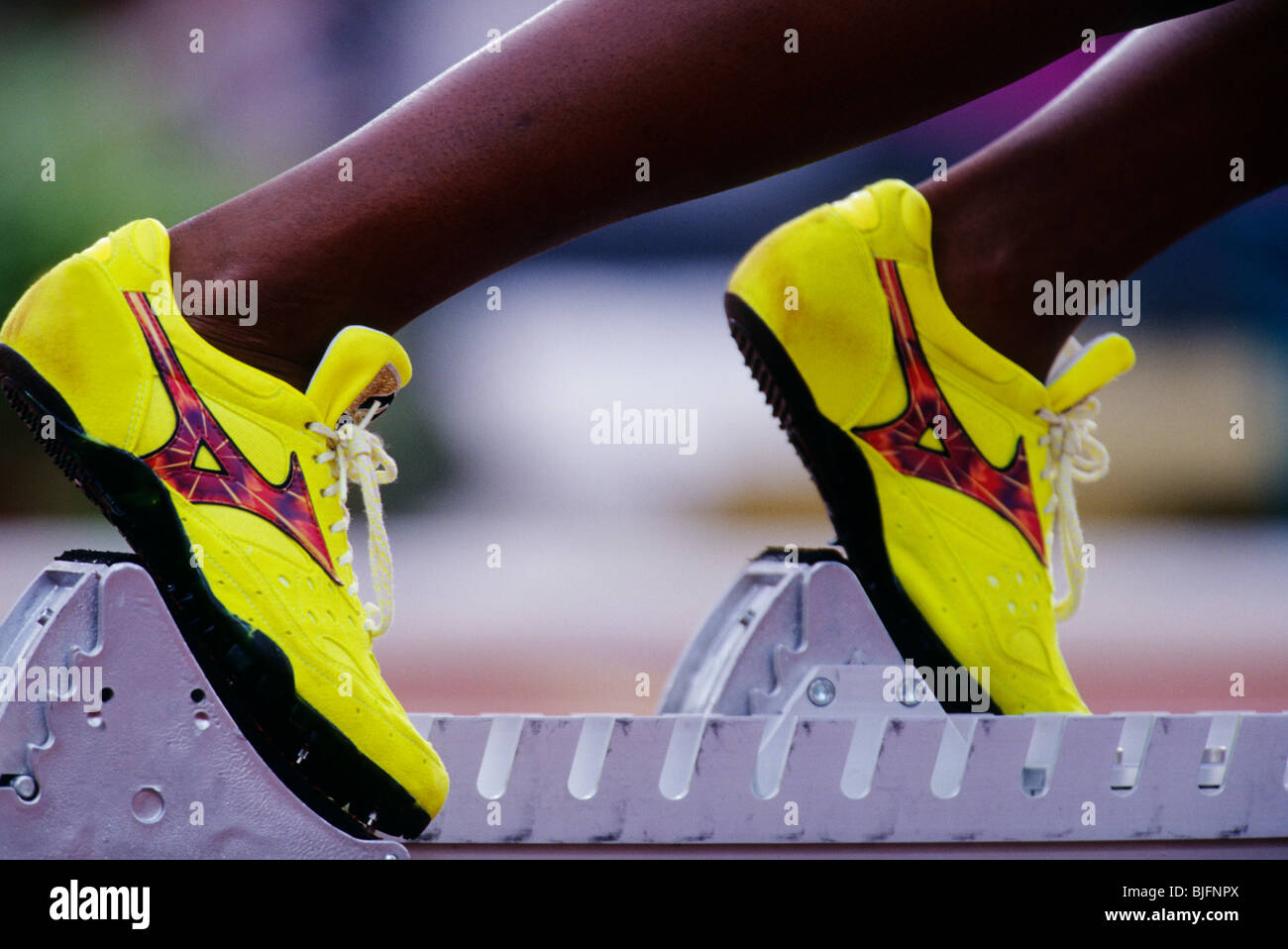 Close up of sprinters feet in the starting block Stock Photo - Alamy