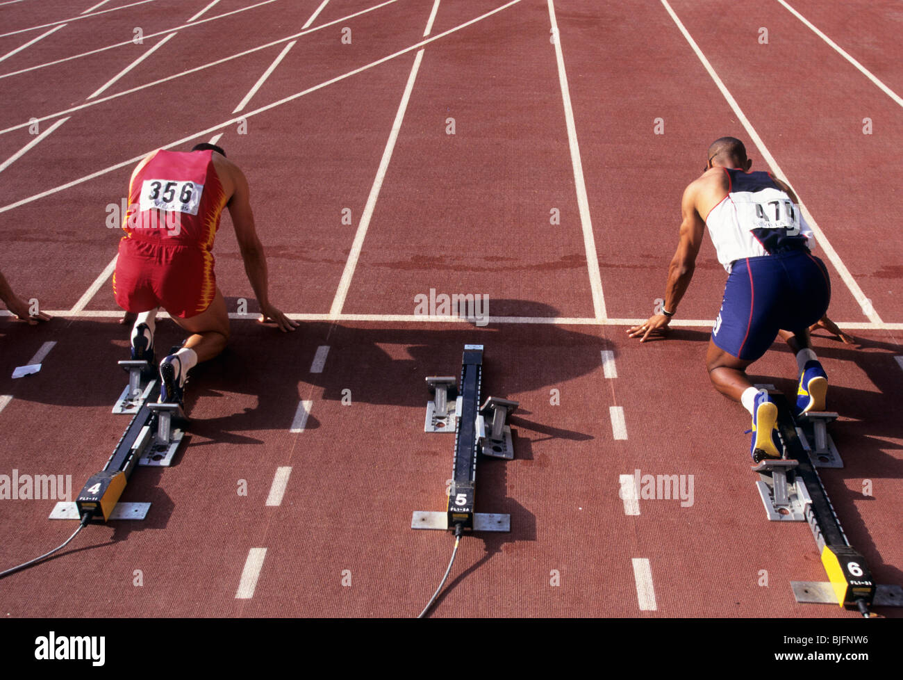 View of sprinters in the starting block Stock Photo - Alamy