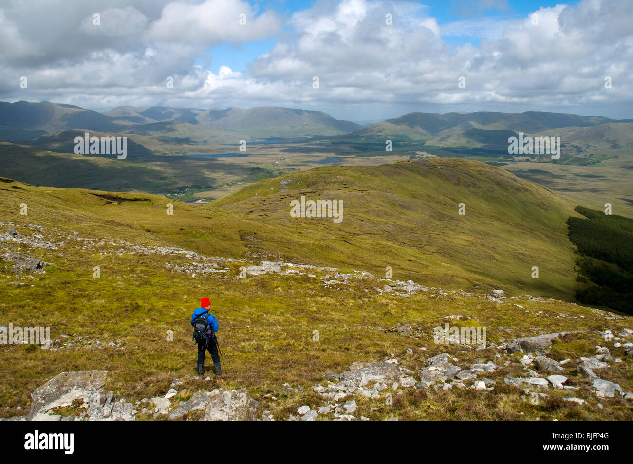 Descending Benbrack, in the Twelve Bens range, Connemara, County Galway ...