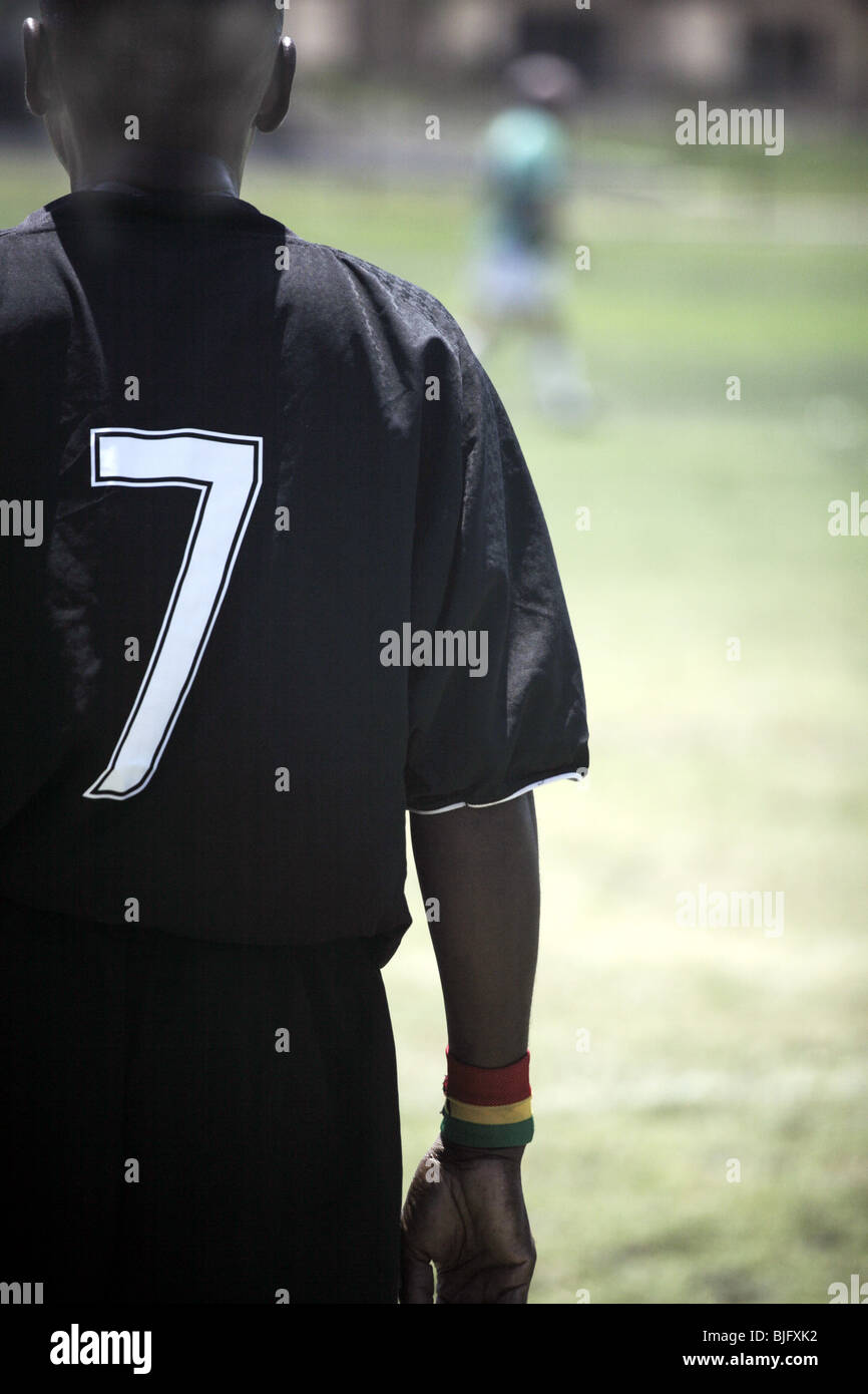 Football player on a pitch Stock Photo - Alamy
