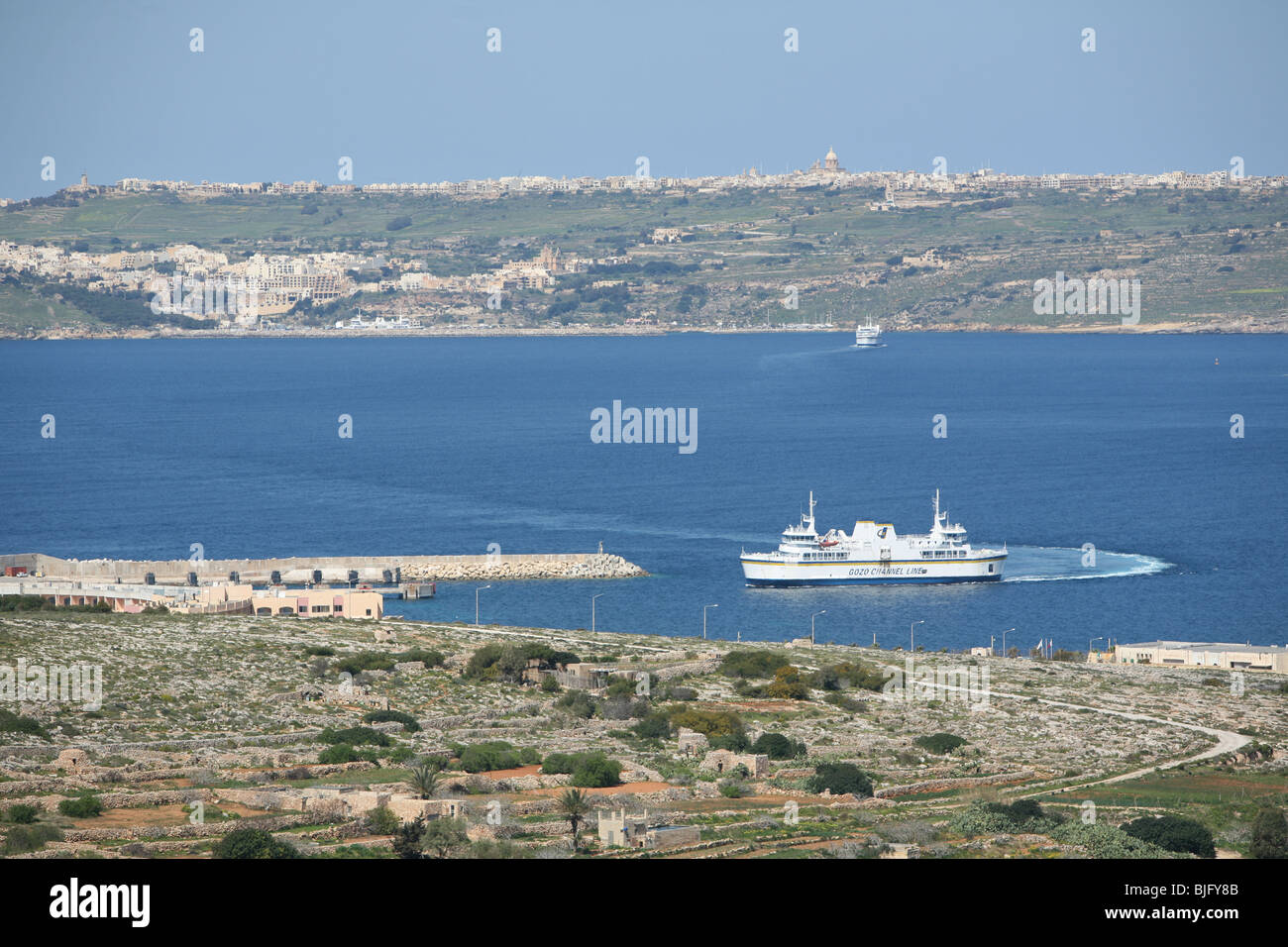 The sea channel between the island of Gozo, on the Maltese archipeligo ...