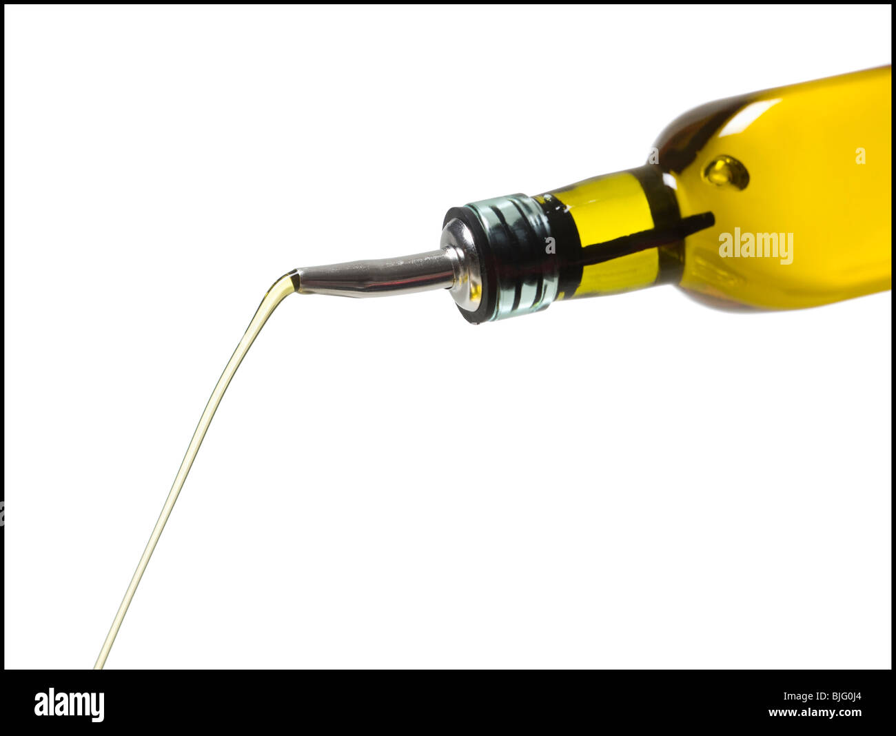 olive oil pouring out of a bottle Stock Photo - Alamy