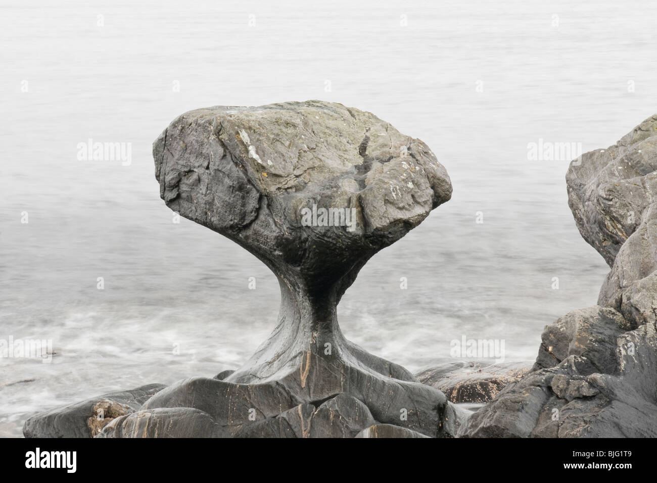 Unusual stone in Atlantic ocean coast. View on Kannesteinen and ...