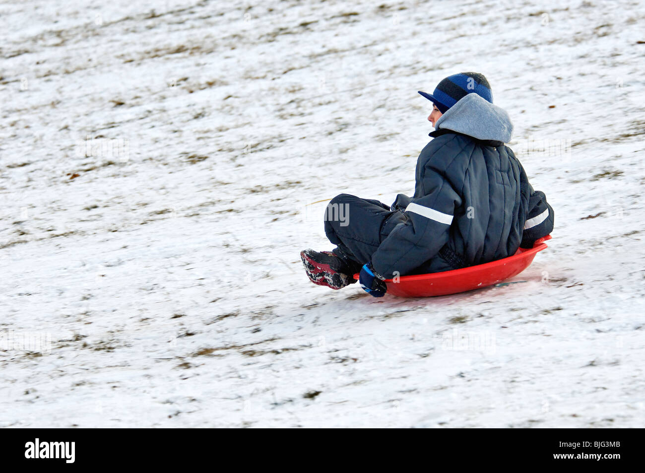 Boy Sledding Down Hill in Cherokee Park in Louisville, Kentucky Stock ...