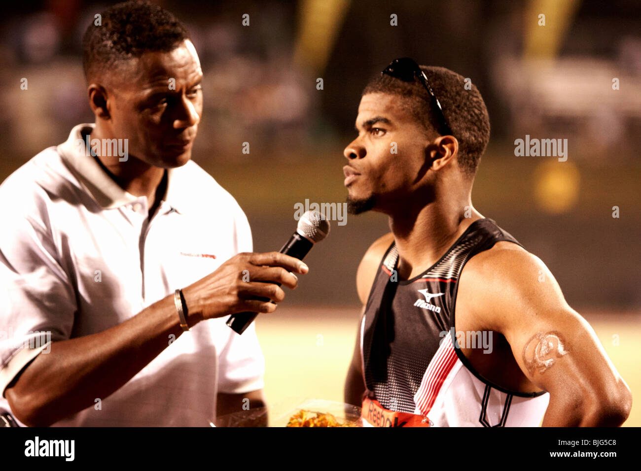 USA's Terrence Trammell being interviewed by Lewis Johnson after ...