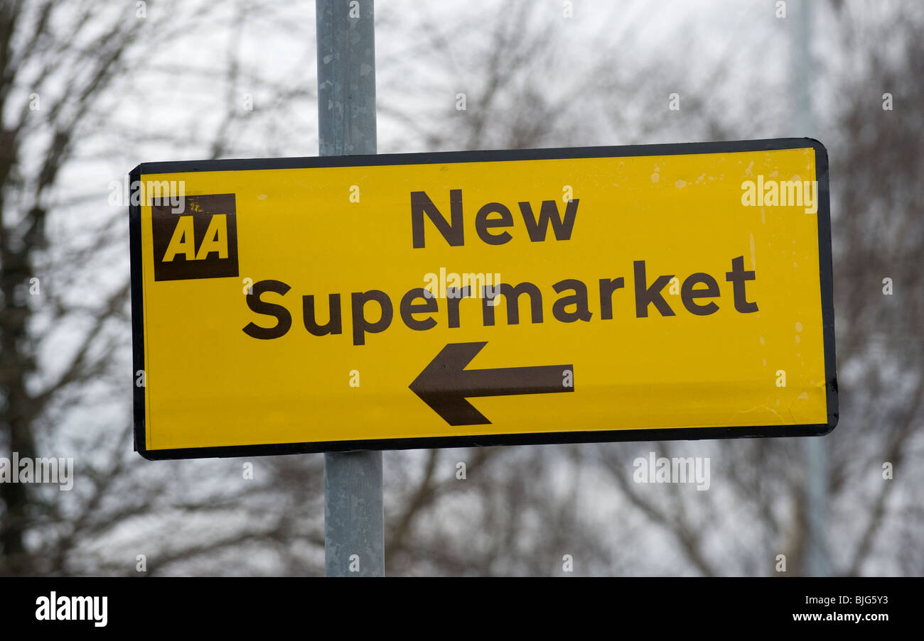 A sign directing shoppers to a new supermarket in the Midlands, England ...