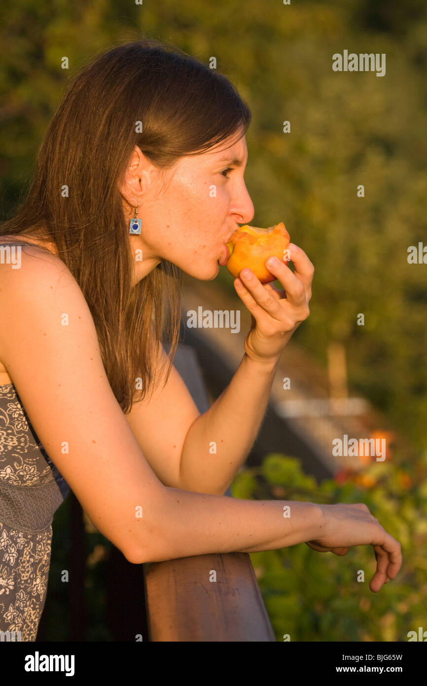 Chewing peach hi-res stock photography and images - Alamy