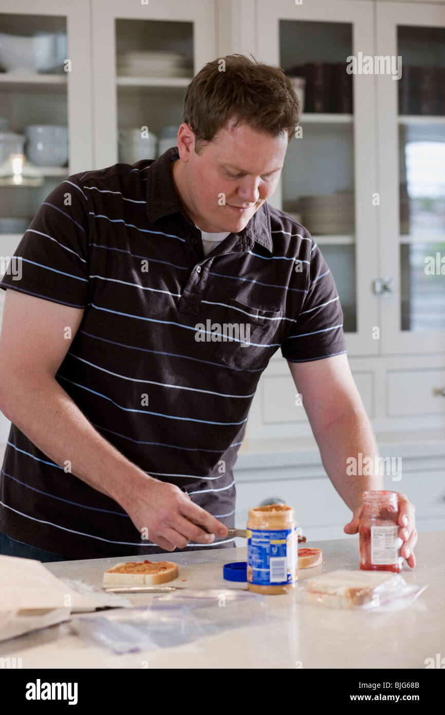 man making a school lunch Stock Photo - Alamy
