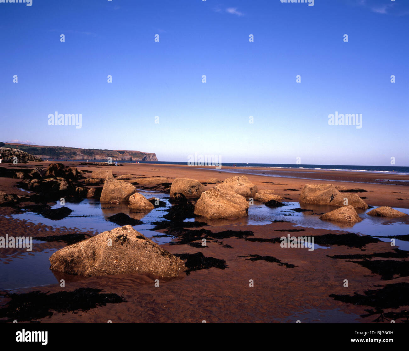 Rock and pools formation on the beach at Whitby North Yorkshire England ...