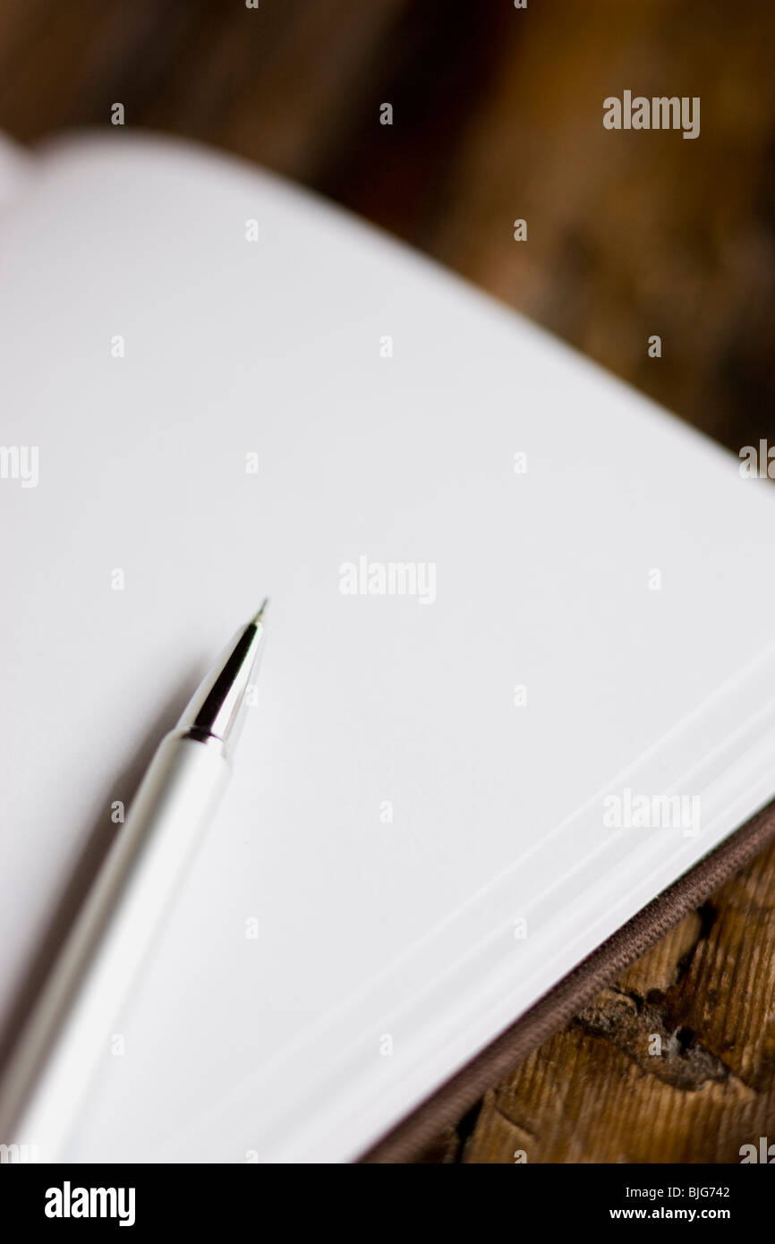 journal and pen Stock Photo - Alamy