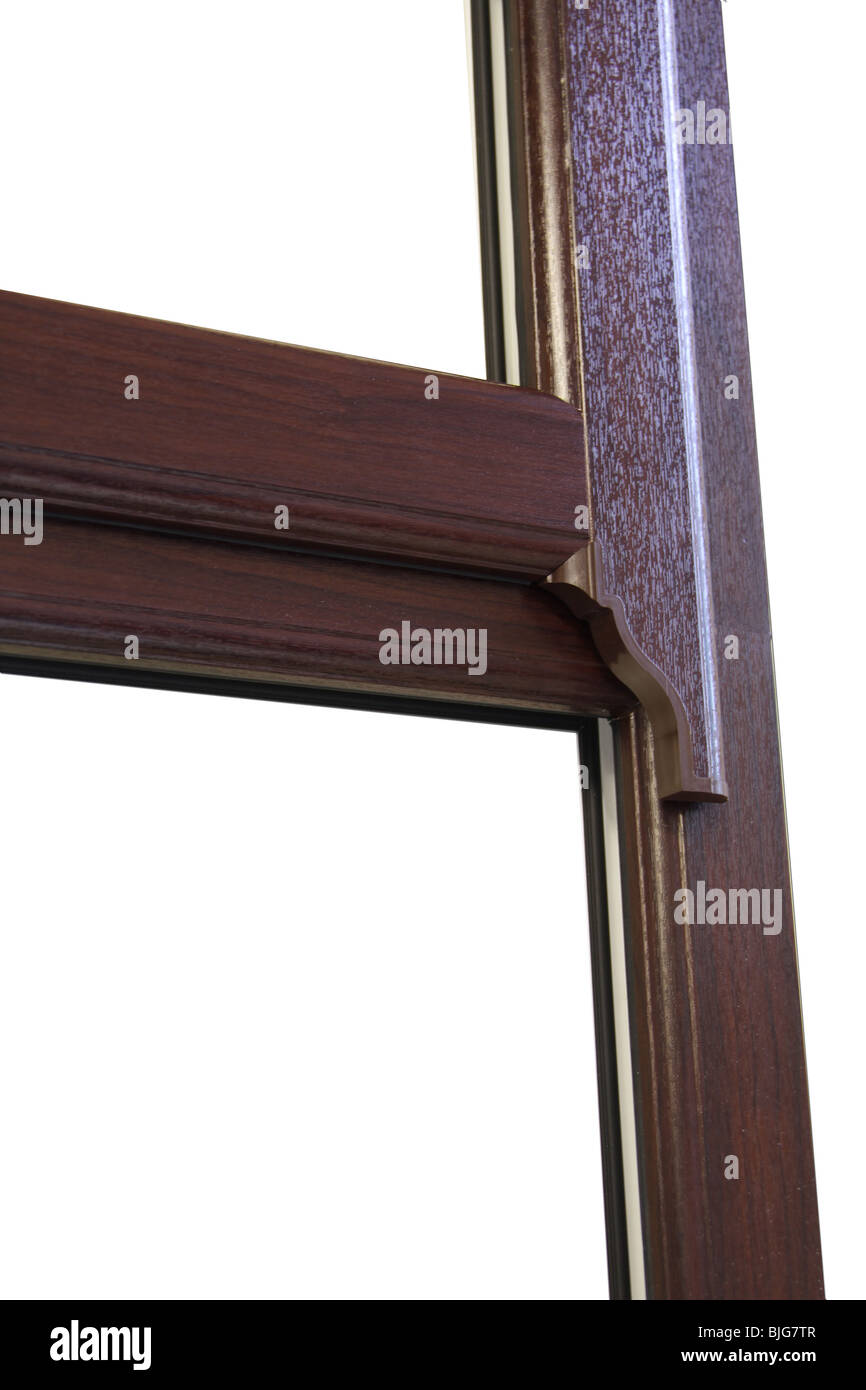 Window in Wood effect UPVC showing Sash Horn detail Stock Photo - Alamy