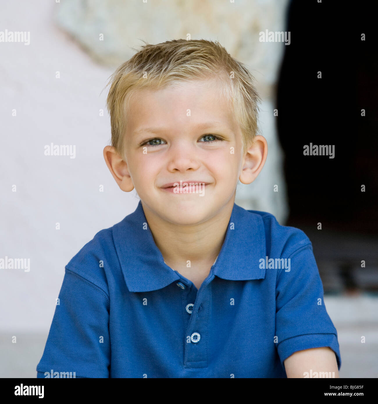 boy in a blue shirt Stock Photo - Alamy