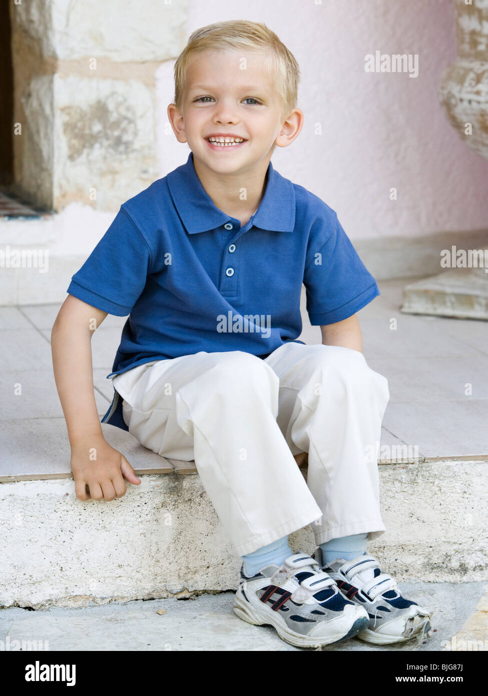 boy in a blue shirt Stock Photo - Alamy
