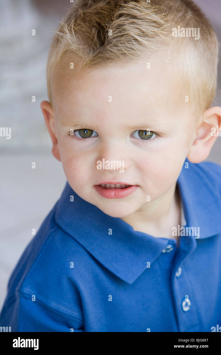 boy in a blue shirt Stock Photo - Alamy