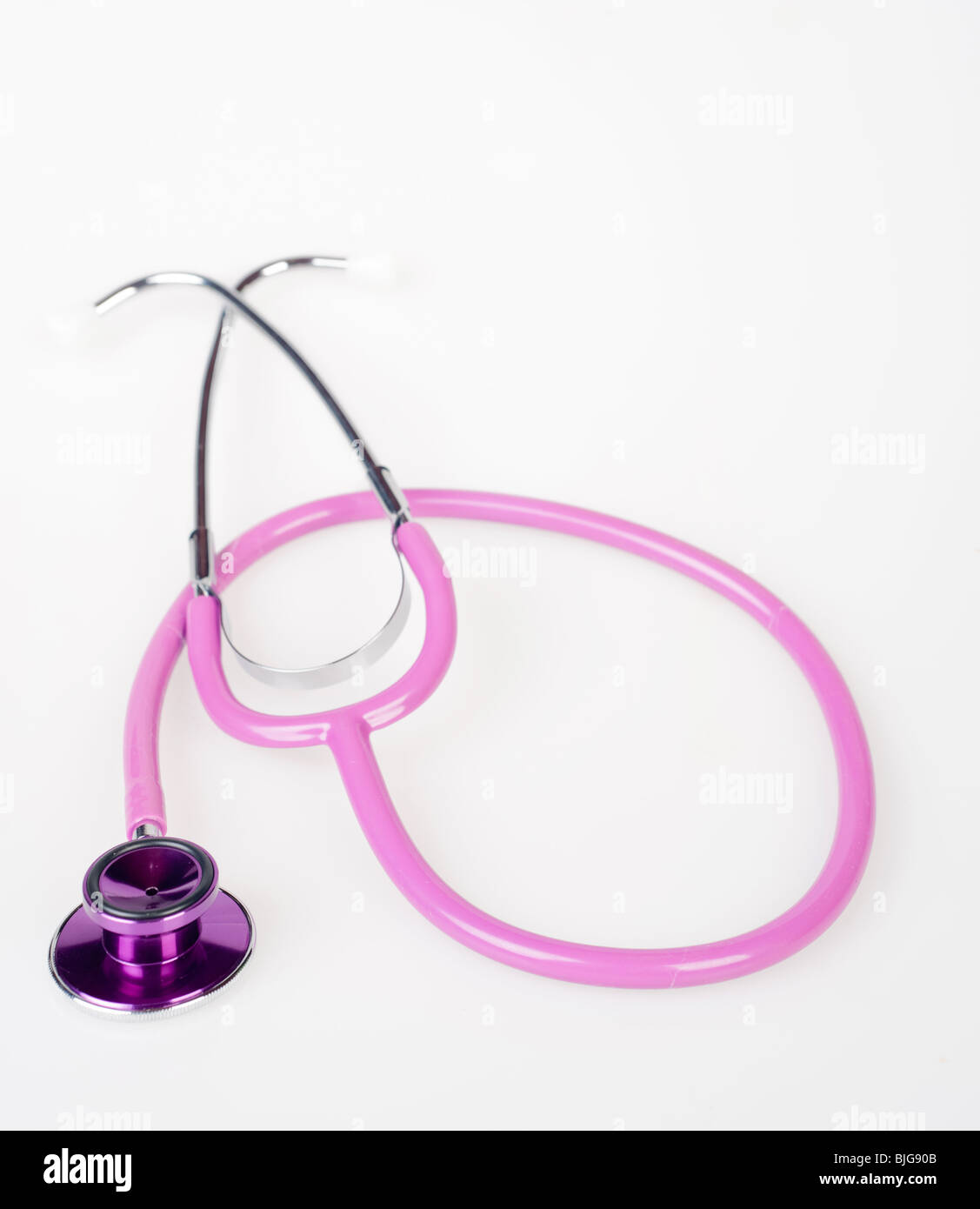 great image of a pink doctors stethoscope on white background Stock ...