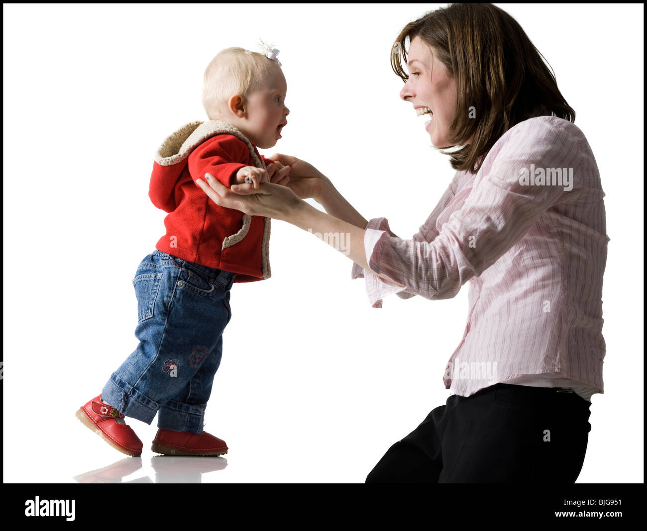 baby girl learning to walk Stock Photo - Alamy