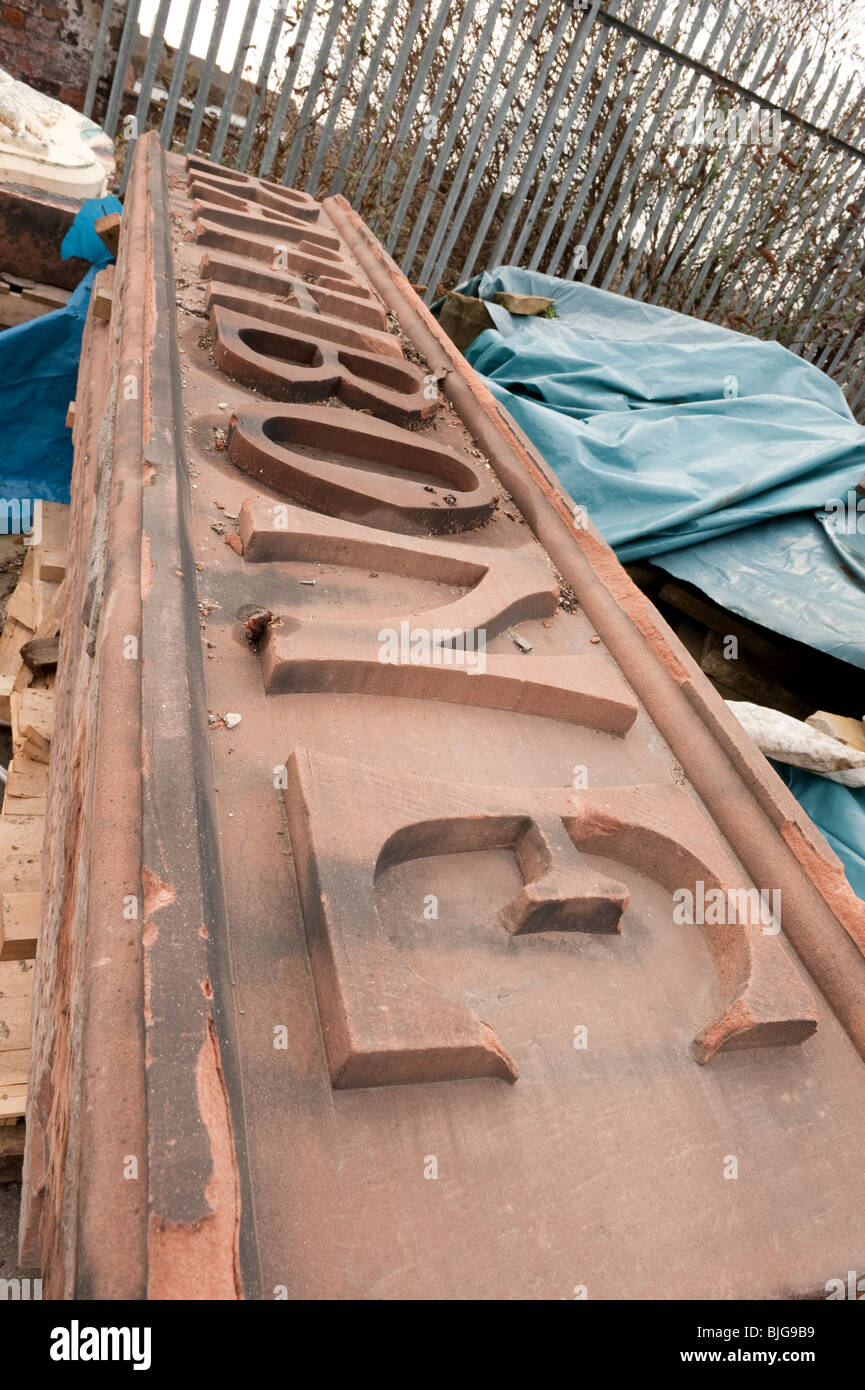 Rathbone sandstone letters carving Stock Photo - Alamy