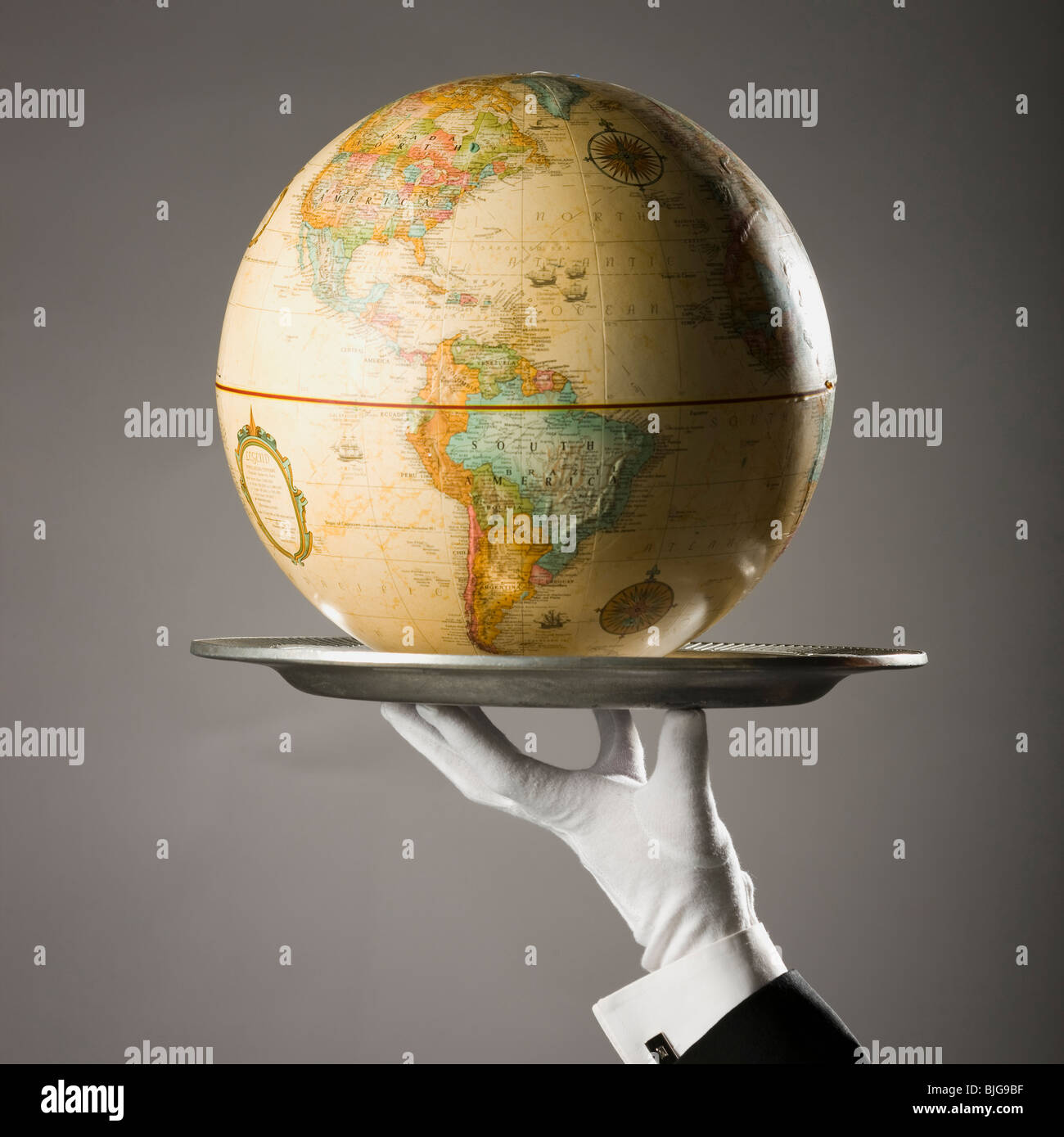 globe on a platter Stock Photo - Alamy