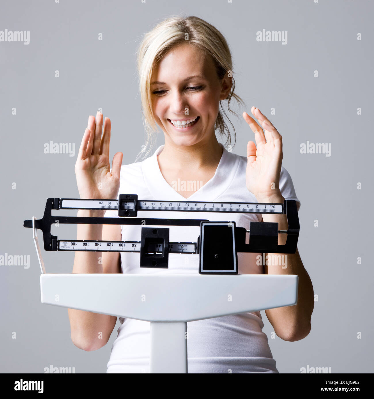 woman on a scale Stock Photo - Alamy