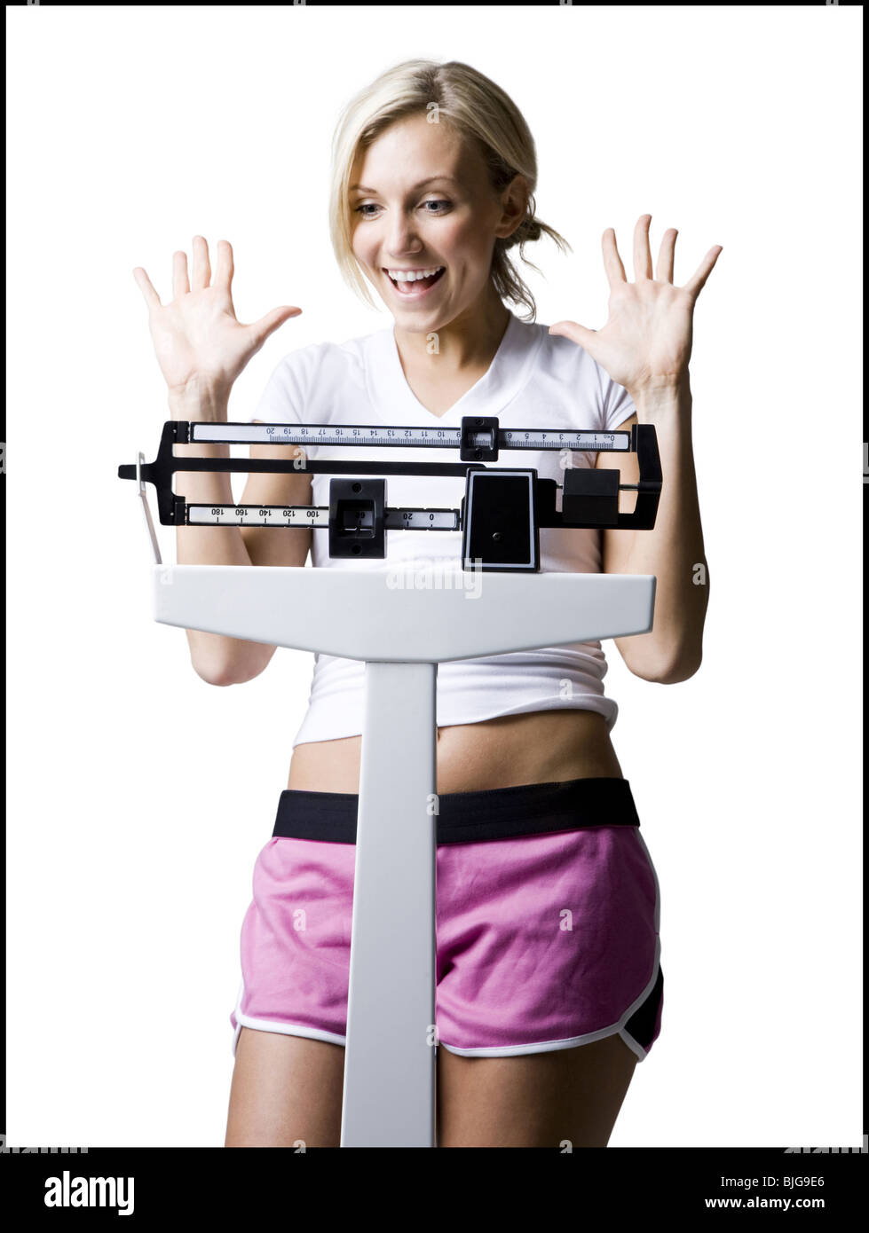 woman on a scale Stock Photo - Alamy