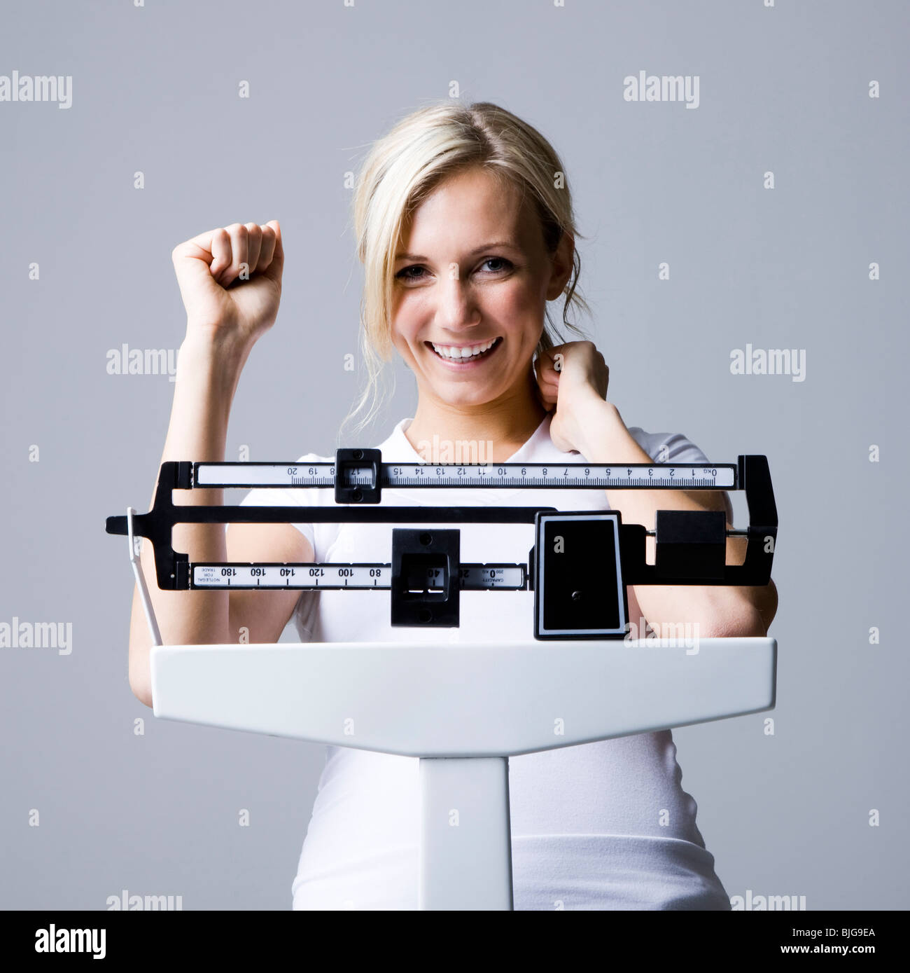 woman on a scale Stock Photo - Alamy