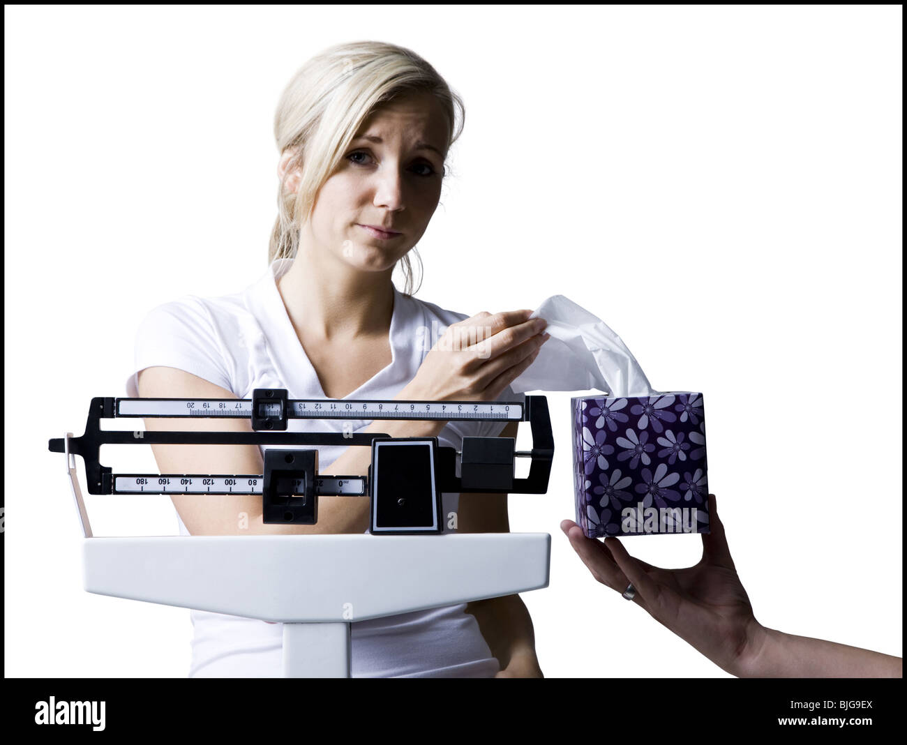 woman on a scale Stock Photo - Alamy