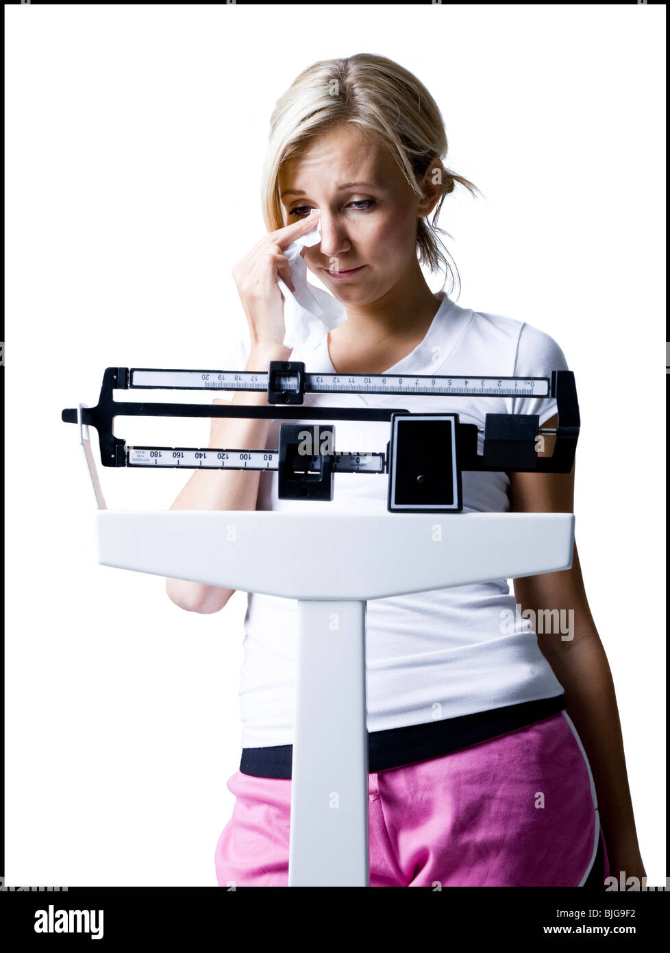 woman on a scale Stock Photo - Alamy