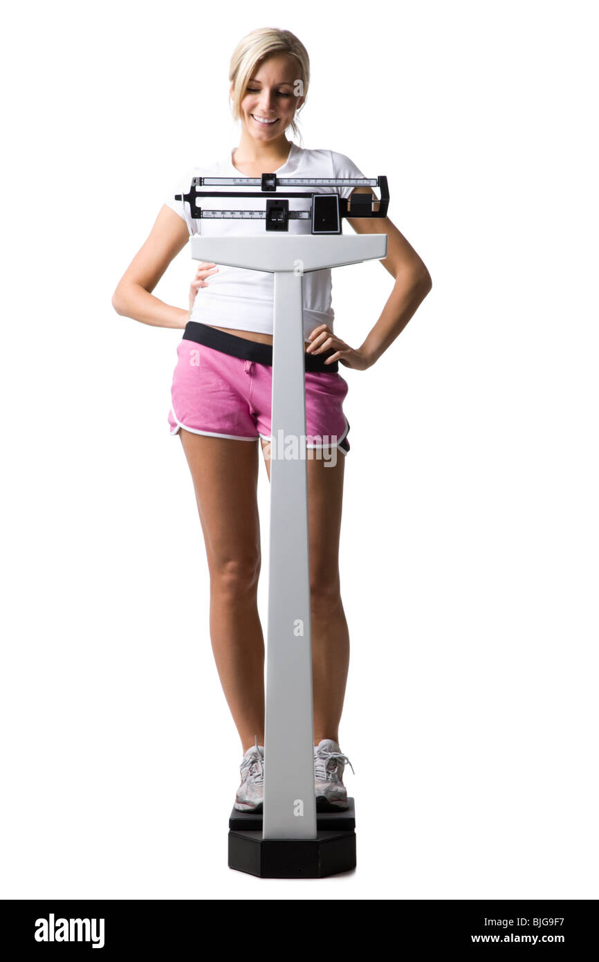 woman on a scale Stock Photo - Alamy