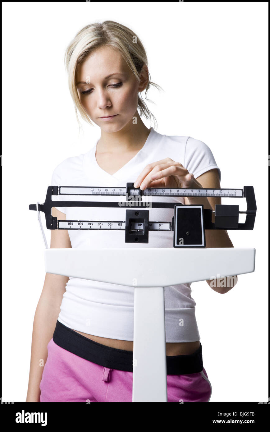 woman on a scale Stock Photo - Alamy