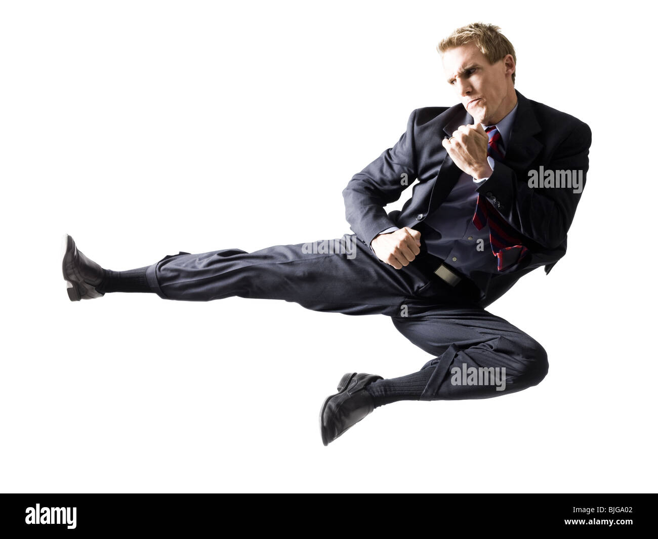 Karate man kicking Cut Out Stock Images & Pictures - Alamy