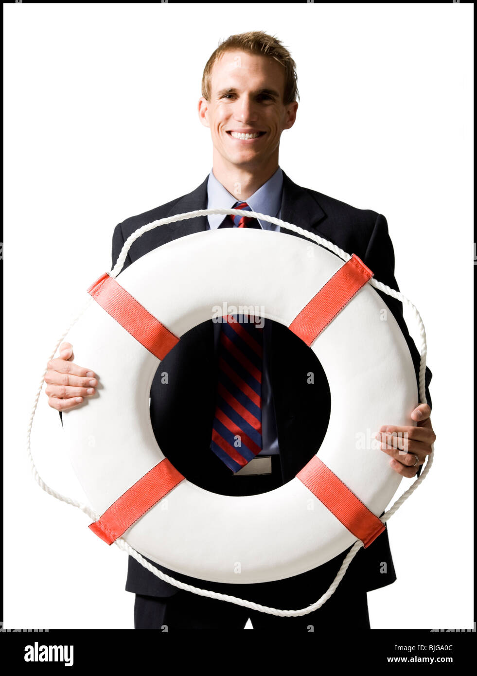 businessman holding a life preserver Stock Photo - Alamy