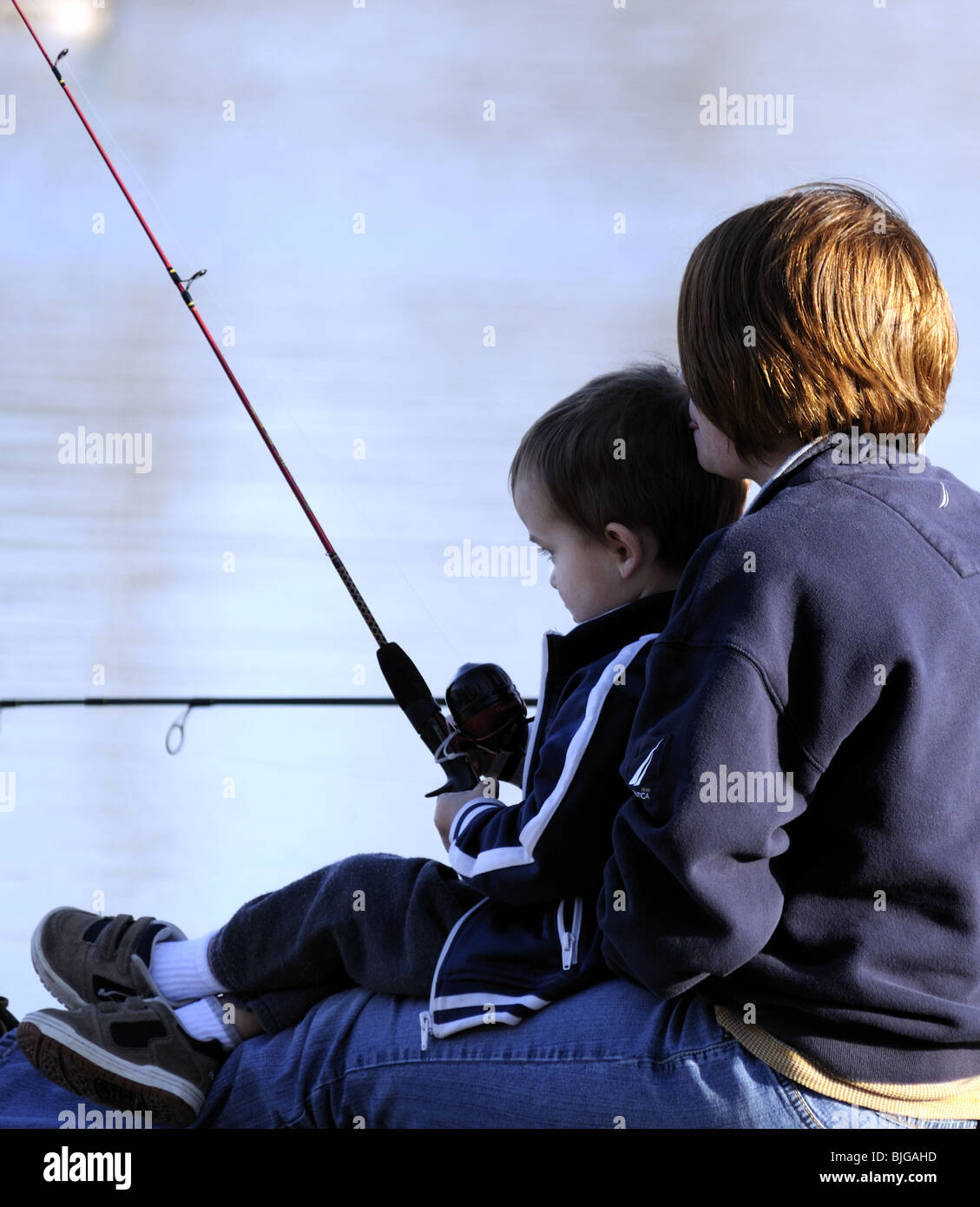 Mom & Son Fishing Stock Photo - Alamy
