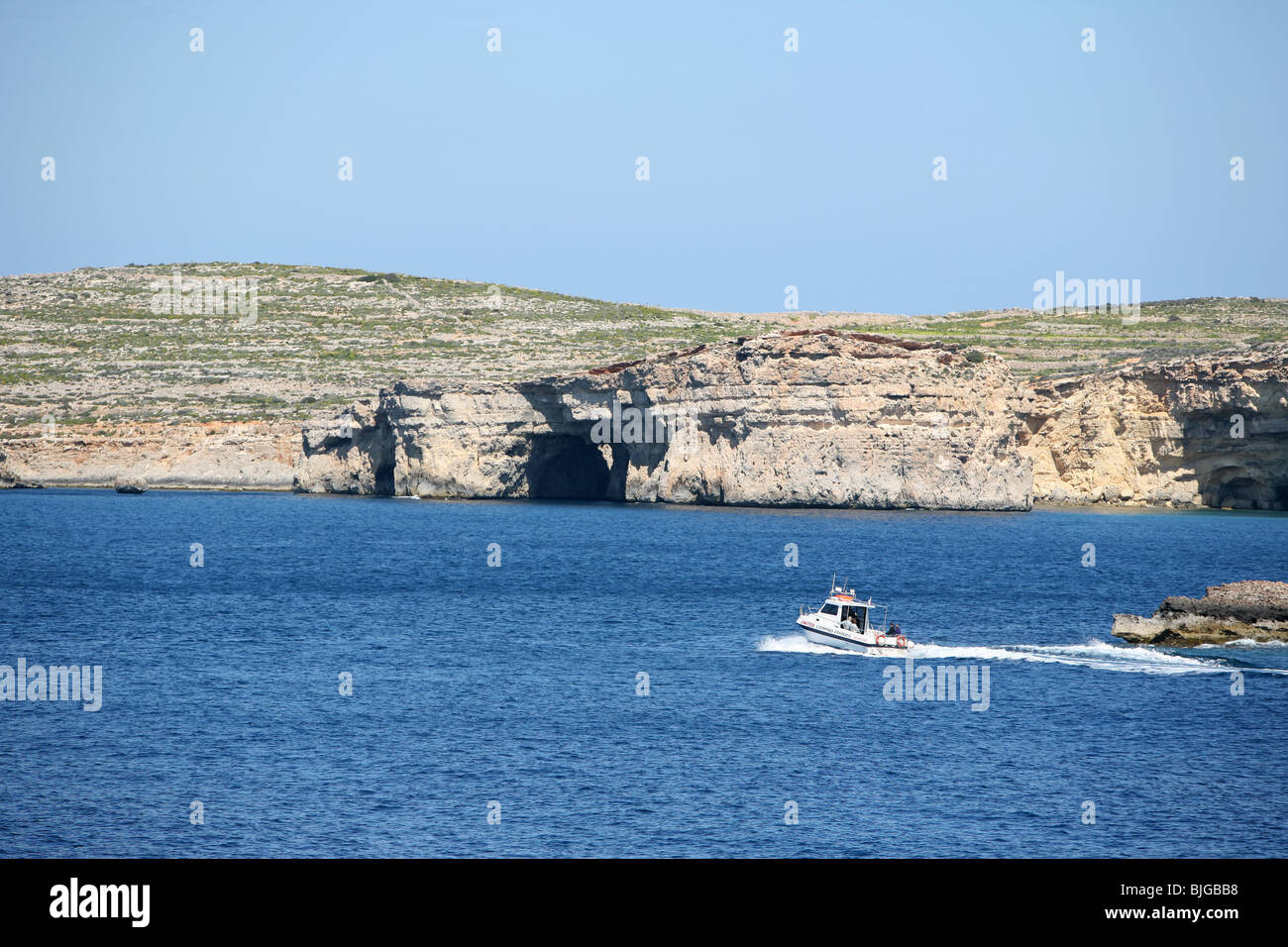 The sea channel between the island of Gozo, on the Maltese archipeligo ...