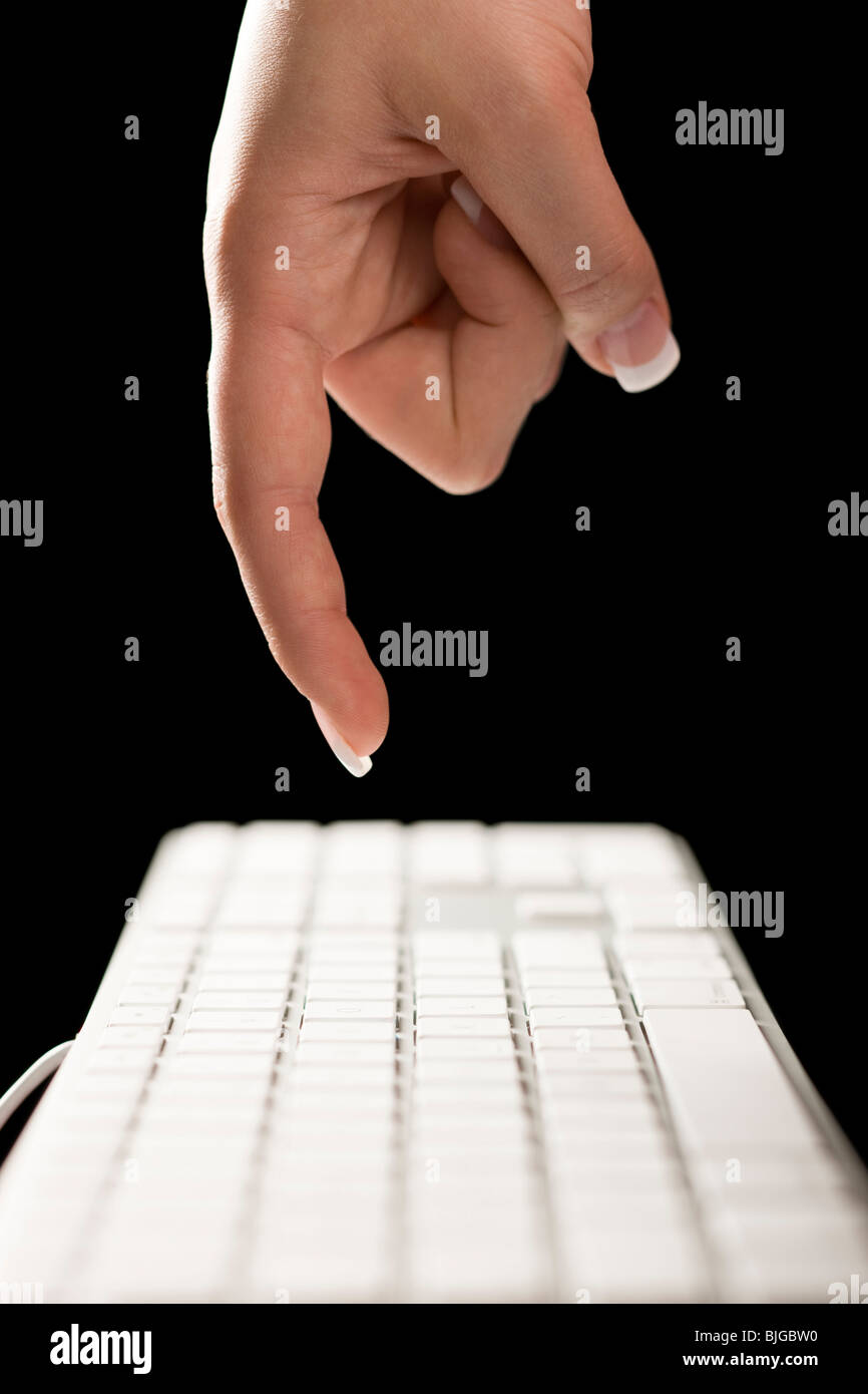 hand about to touch a keyboard Stock Photo - Alamy