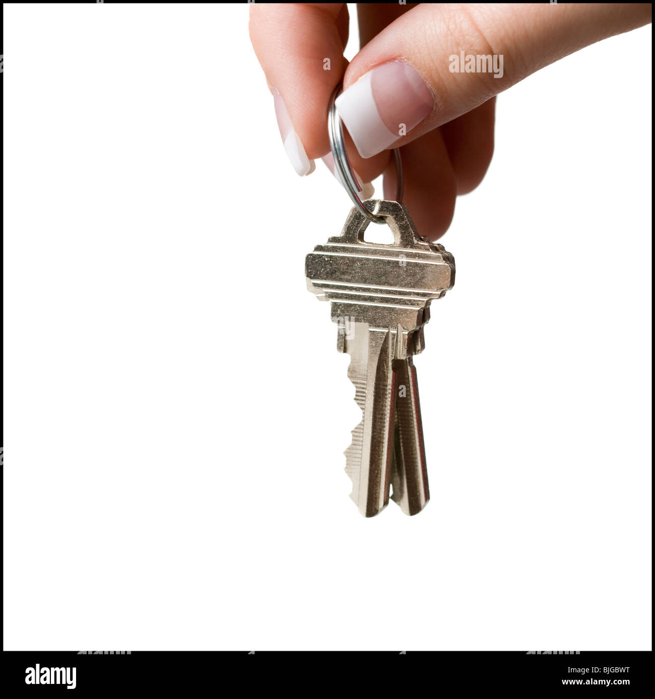 Hand holding keys Stock Photo - Alamy